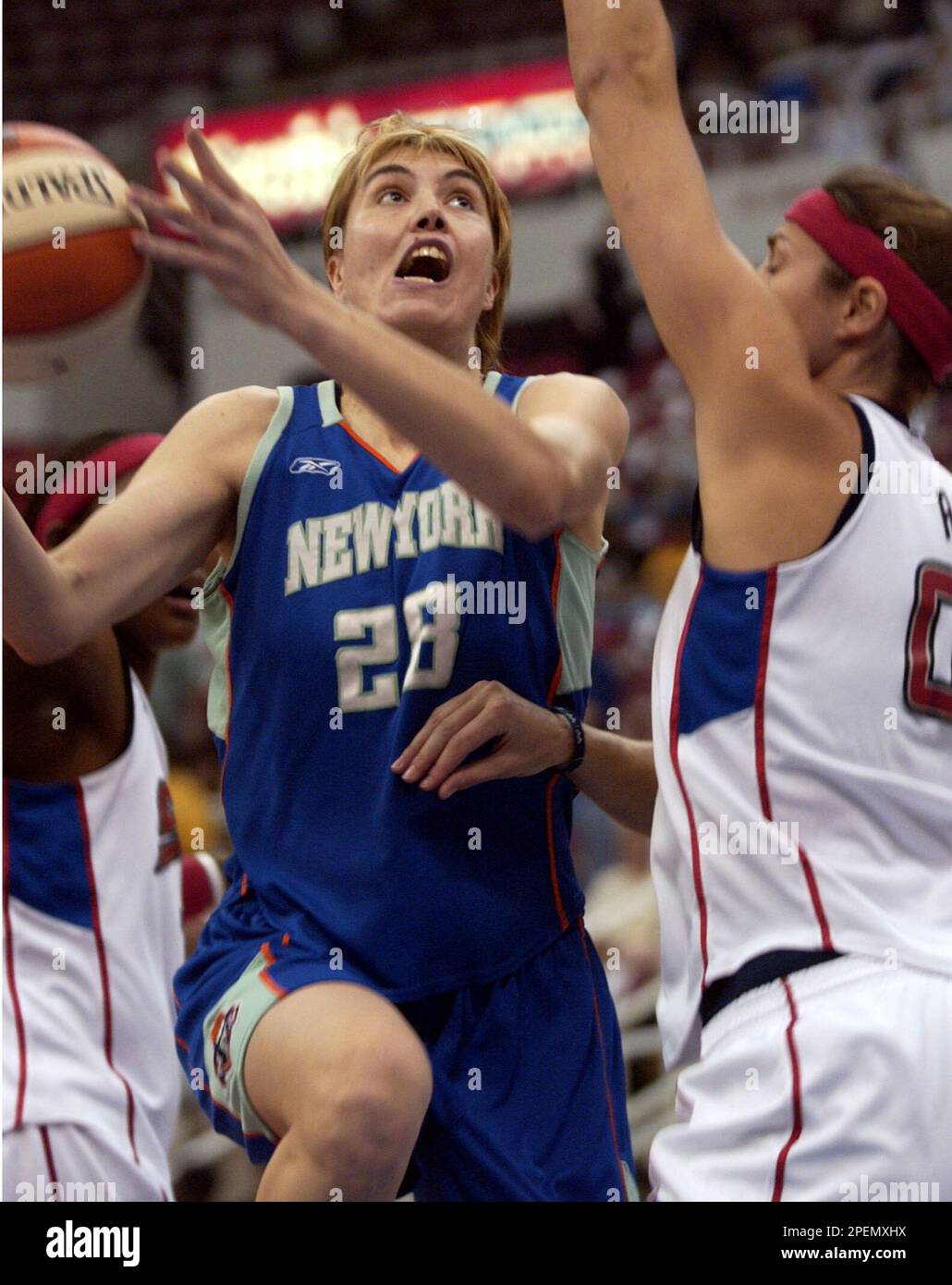 New York Liberty's Elena Baranova (28) tries to shoot past Detroit ...