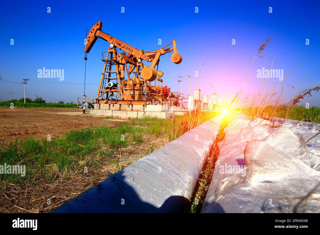Oil pipes and valves Stock Photo - Alamy