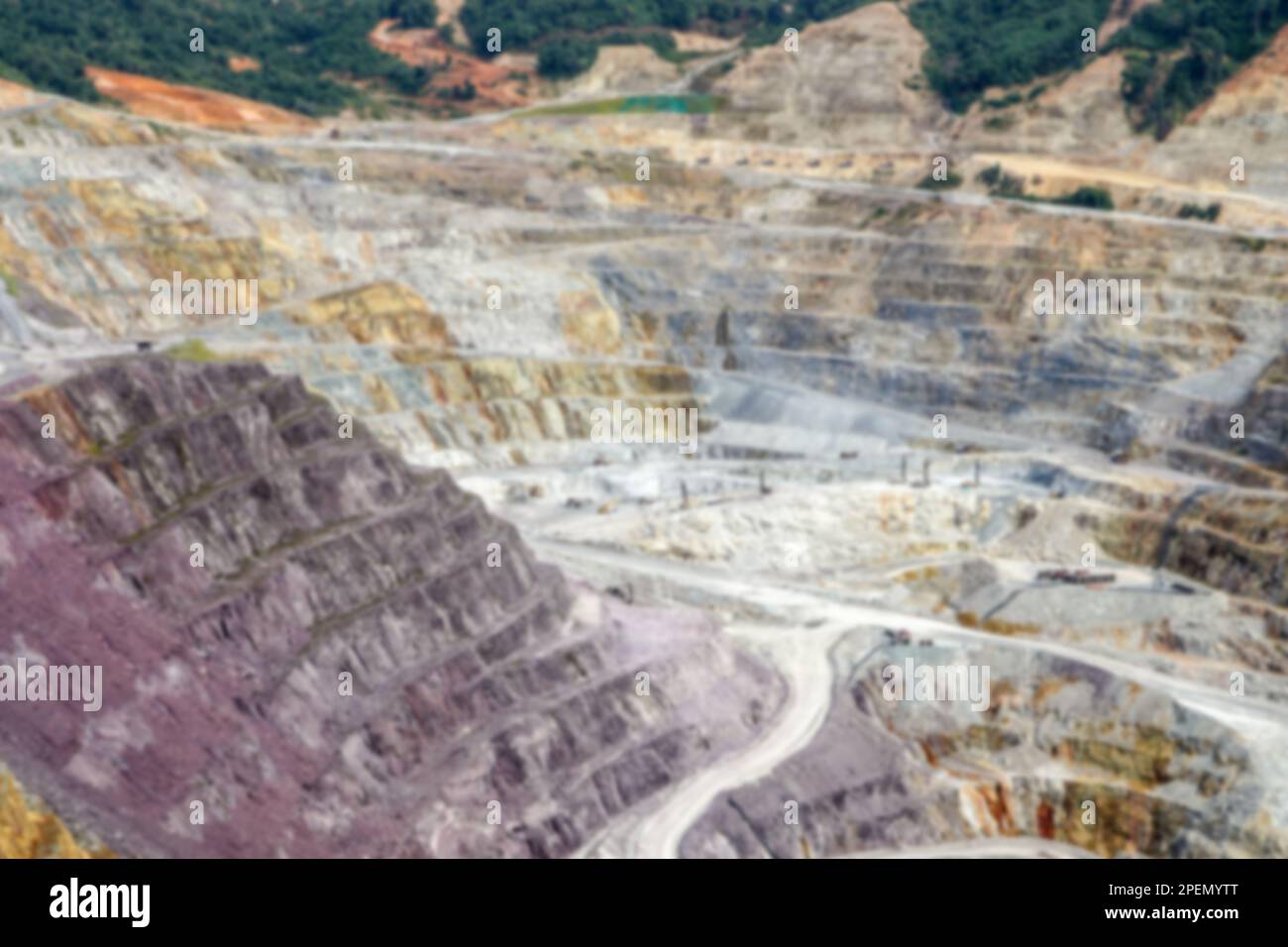 Blurred background of open pit mining. Aerial view of industrial slope ...