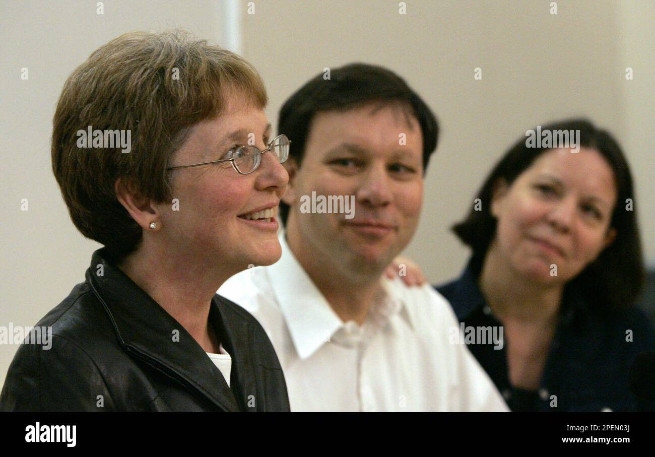 Wendy Becker, left, smiles during a news conference Thursday, Sept. 23 ...