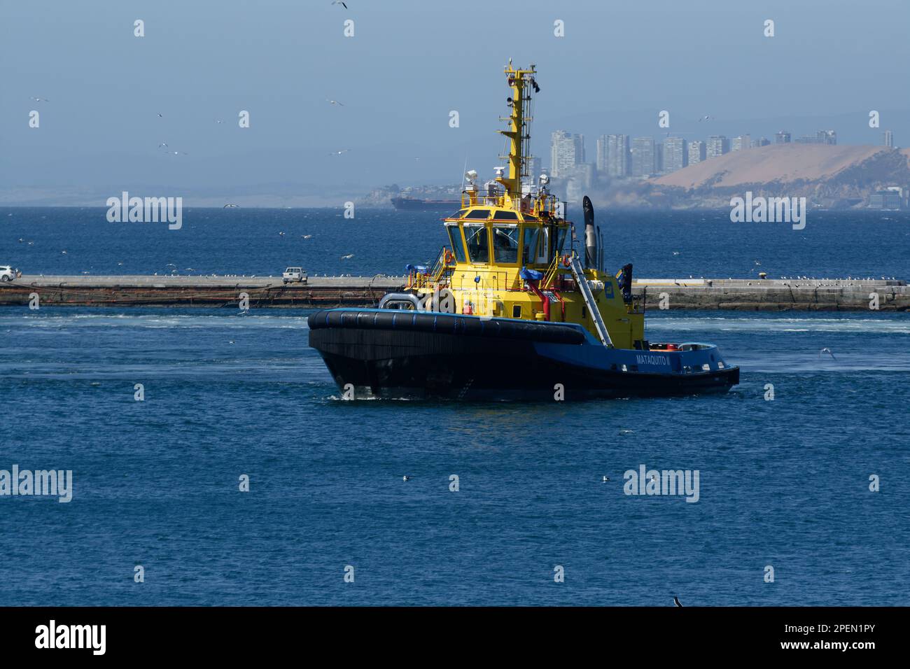 A Powerful Yellow Tug in Valparaiso Harbour in Chile.Tugs are important ...