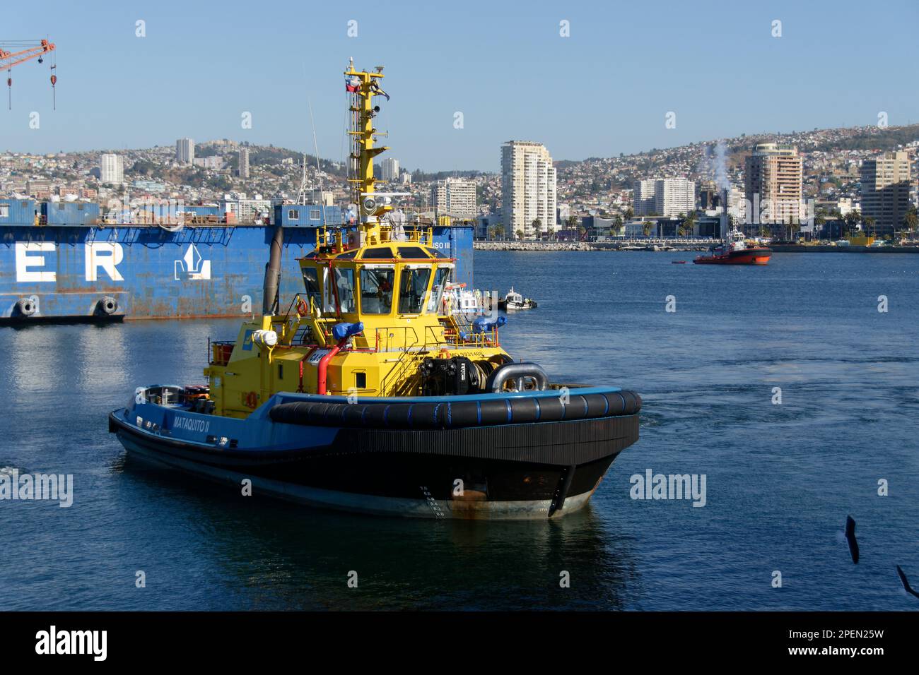 A Powerful Yellow Tug in Valparaiso Harbour in Chile.Tugs are important ...