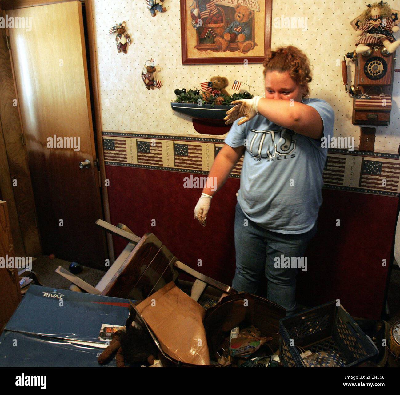 Jessica Christian reacts Tuesday, Sept. 21, 2004, as she assesses how ...