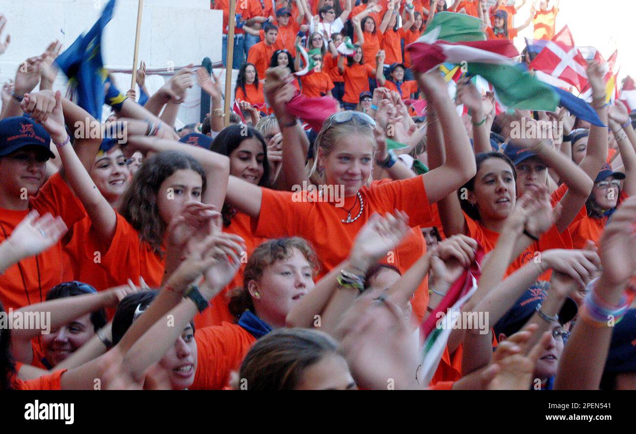 Schoolchildren wave flags during the annual school year inauguration ...