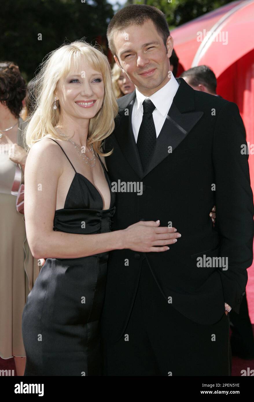 Actress Anne Heche, left, is joined by husband Coleman Laffoon as she ...