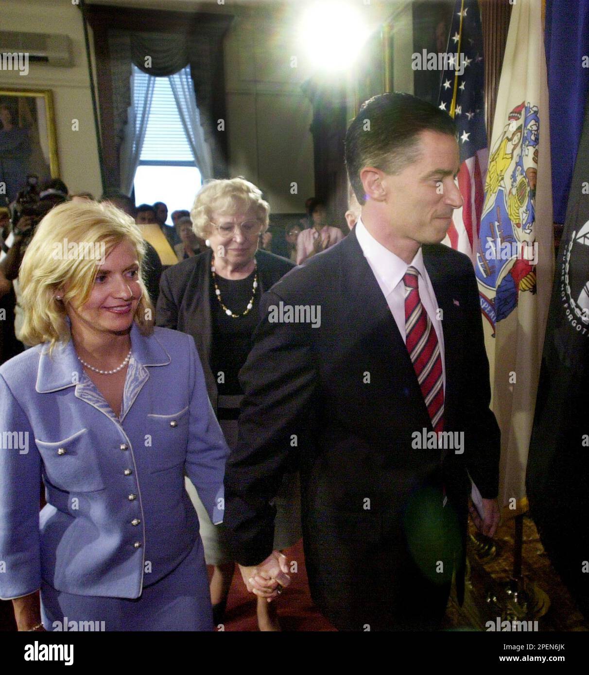 ** FILE ** New Jersey Gov. James E. McGreevey, right, leaves his office ...