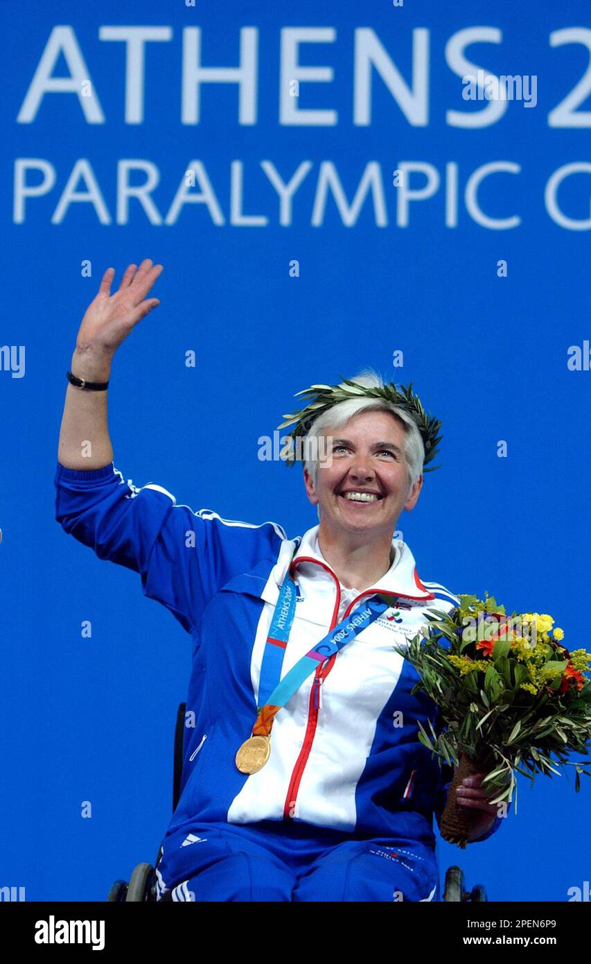 Britain's Isabel Newstead waves to the crowd with her gold medal after ...