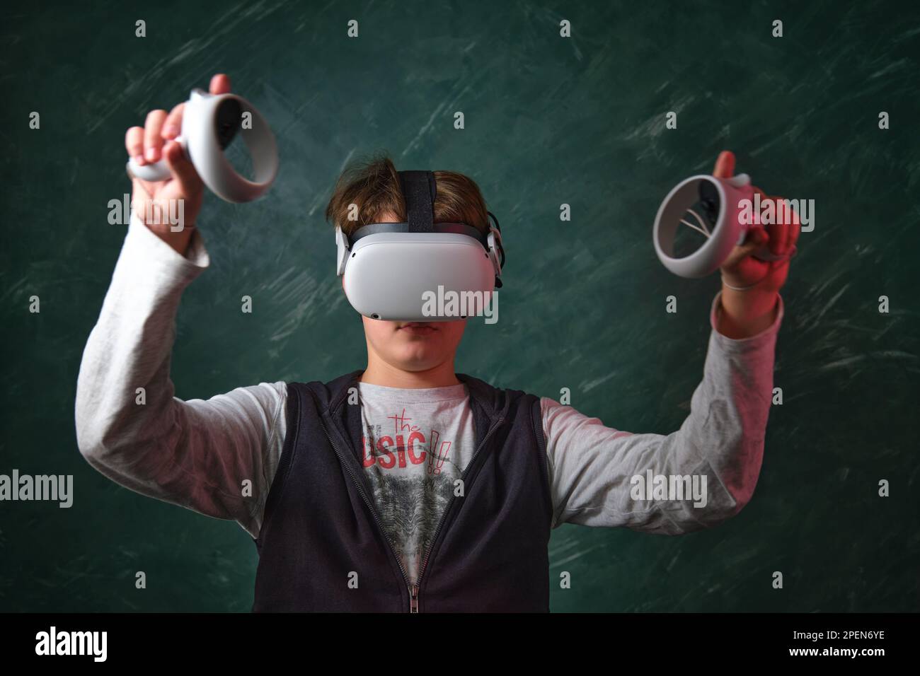 a boy playing with VR headset Stock Photo - Alamy