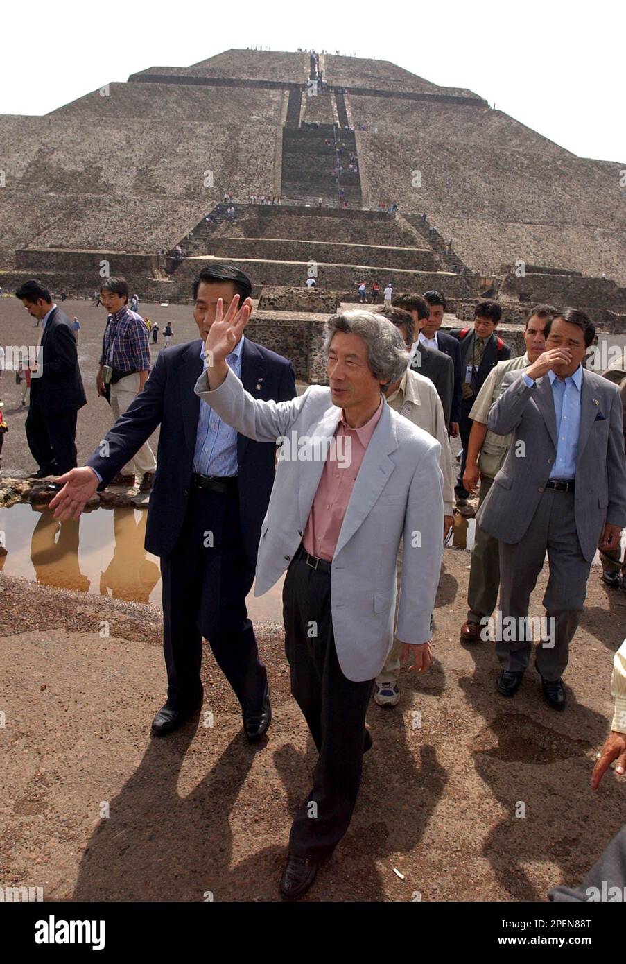 Japanese Prime Minister Junichiro Koizumi arrives at the ruins in ...