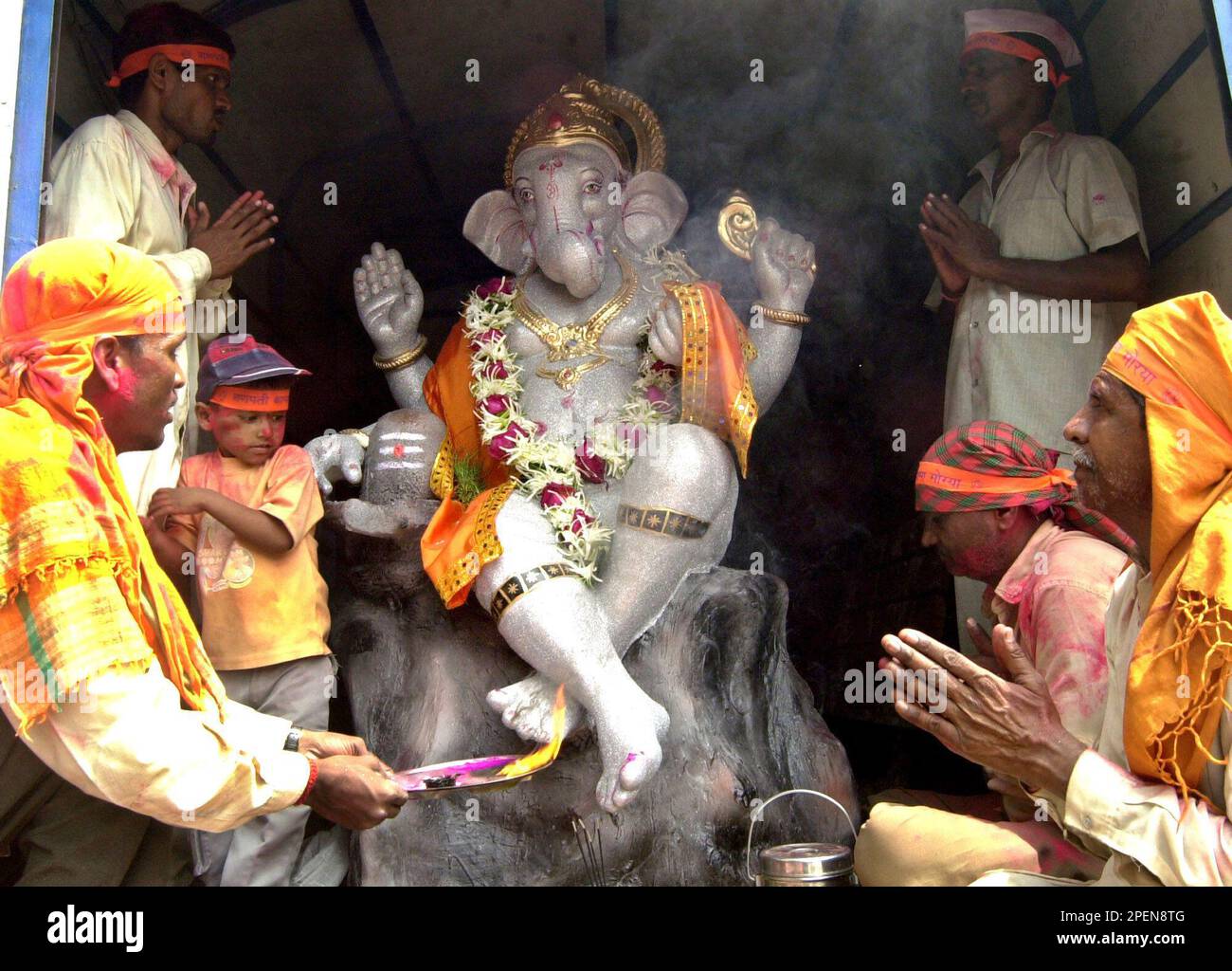 Indian Hindus offer prayers to an idol of elephant headed Hindu God ...