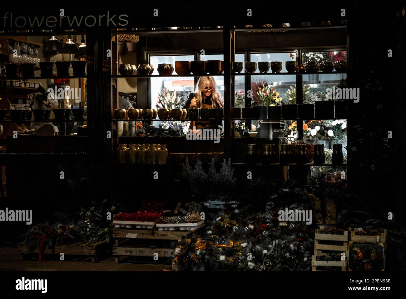 A retail store showcasing a wide array of vibrant flowers showcased in ... A retail store showcasing a wide array of vibrant flowers showcased in ...