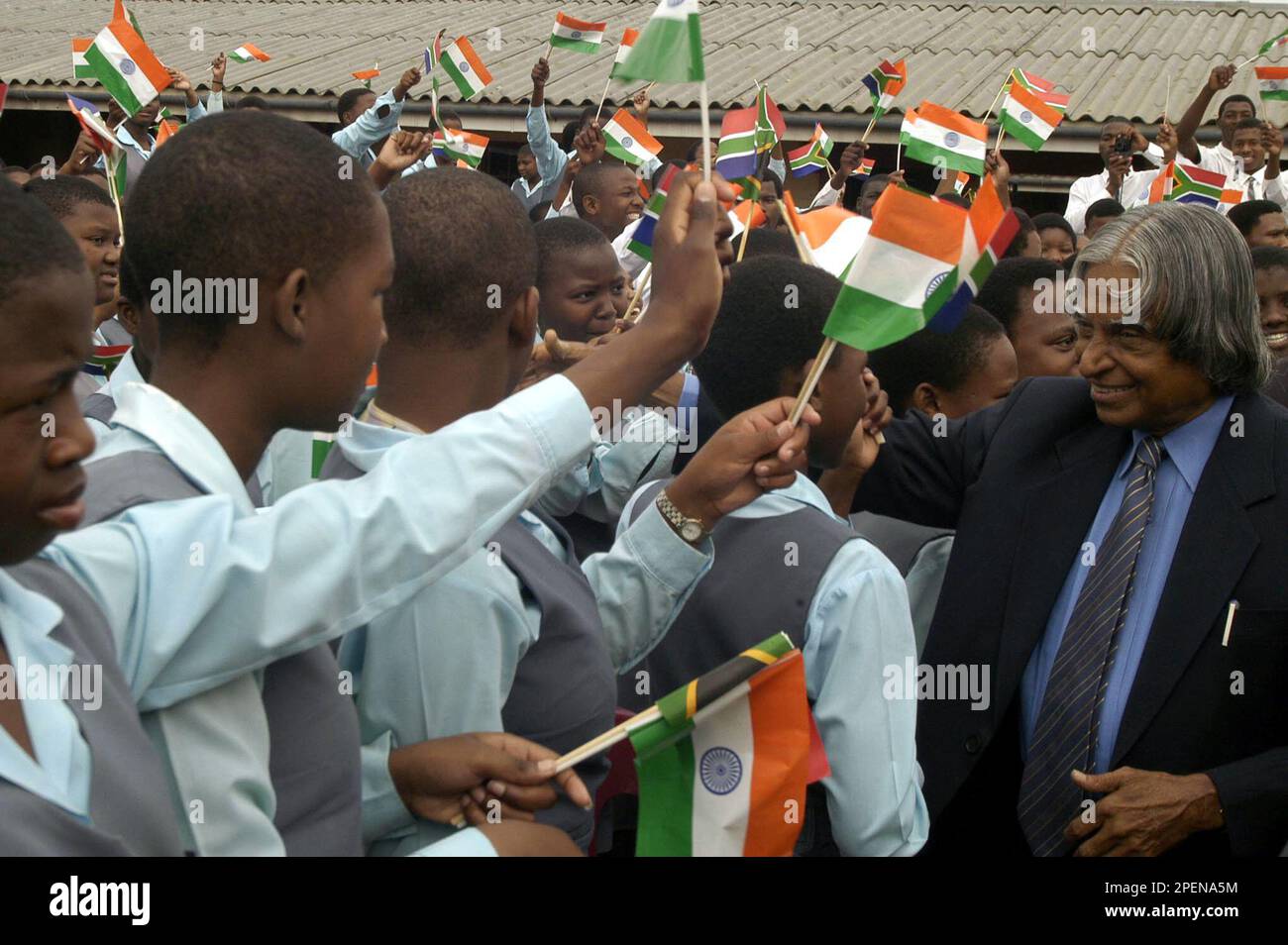 Indian President, Abdul Kalam, right, waves to school children who wave ...