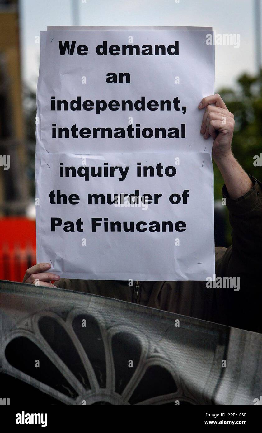 Sinn Fein supporters hold a protest outside Belfast Crown Court ...