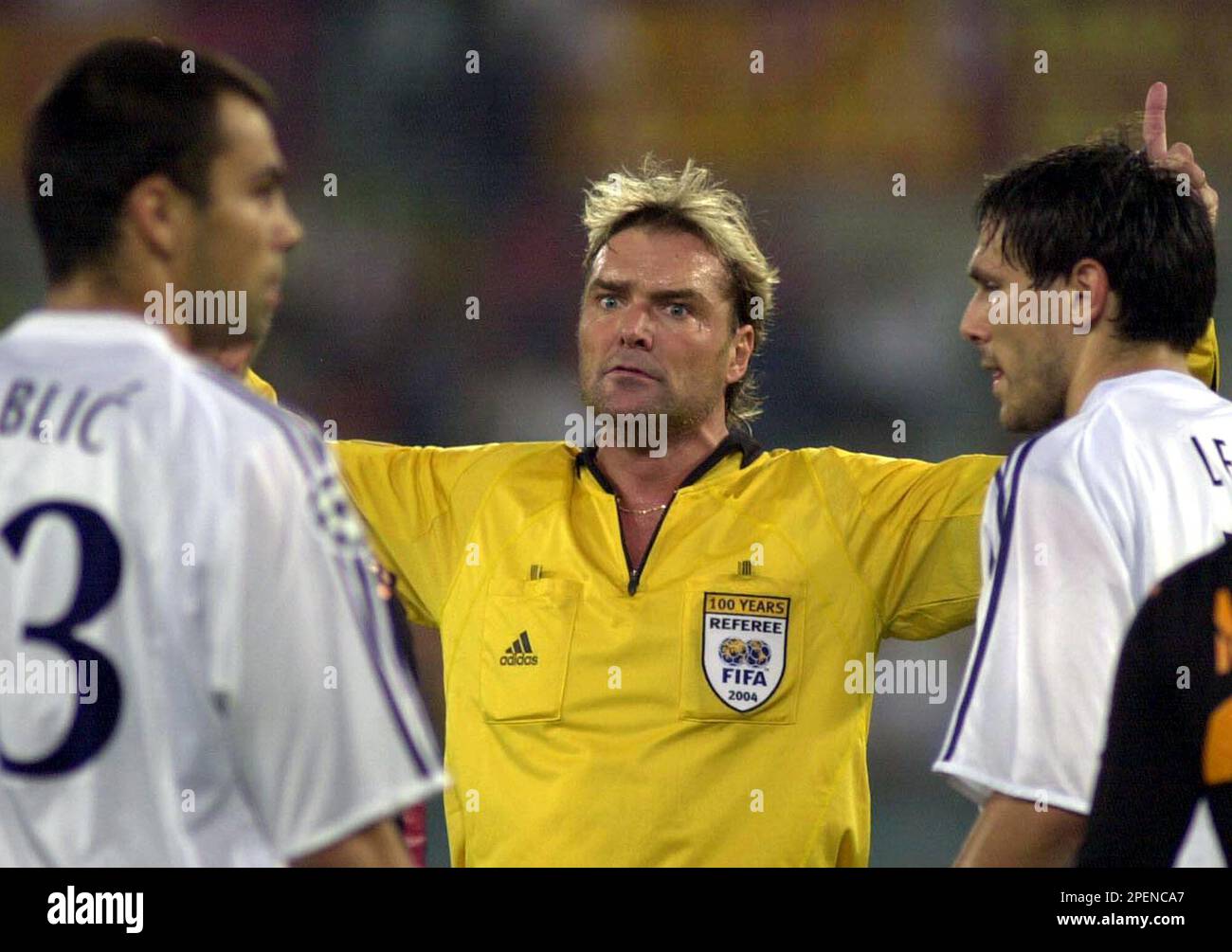 Swedish Referee Anders Frisk gestures during the Group B, Champions ...