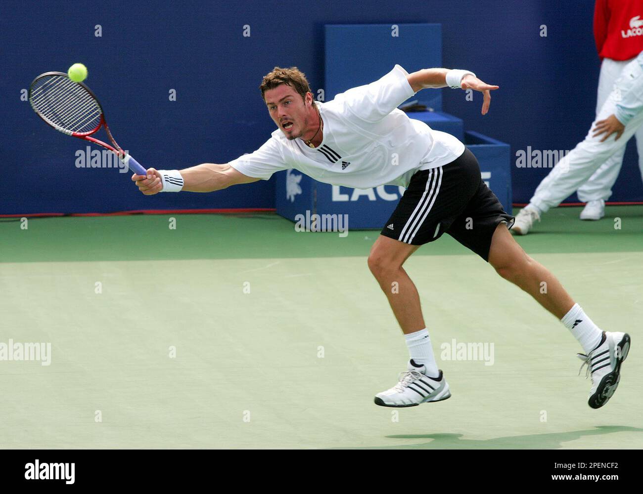 Russia's Marat Safin reaches for a return during his match against Alex ...