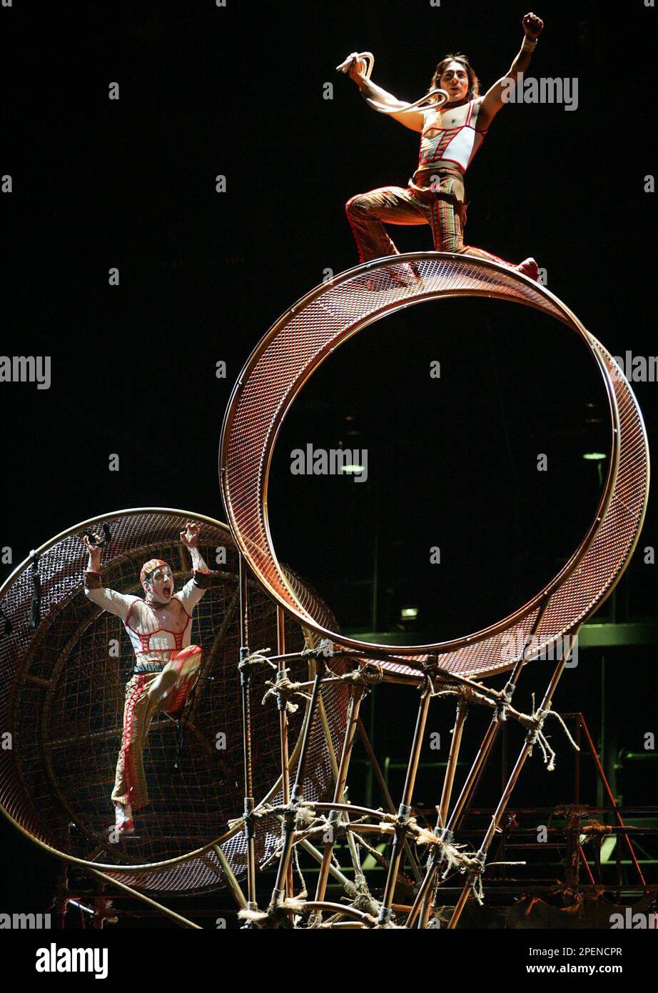 Performers pose at the end of their act in Las Vegas's newest Cirque Du ...