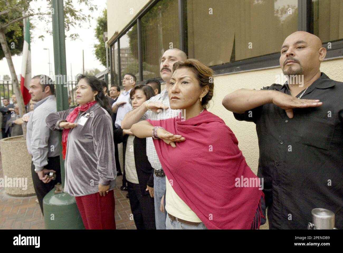 People pay tribute as the Mexican national anthem is sung ...