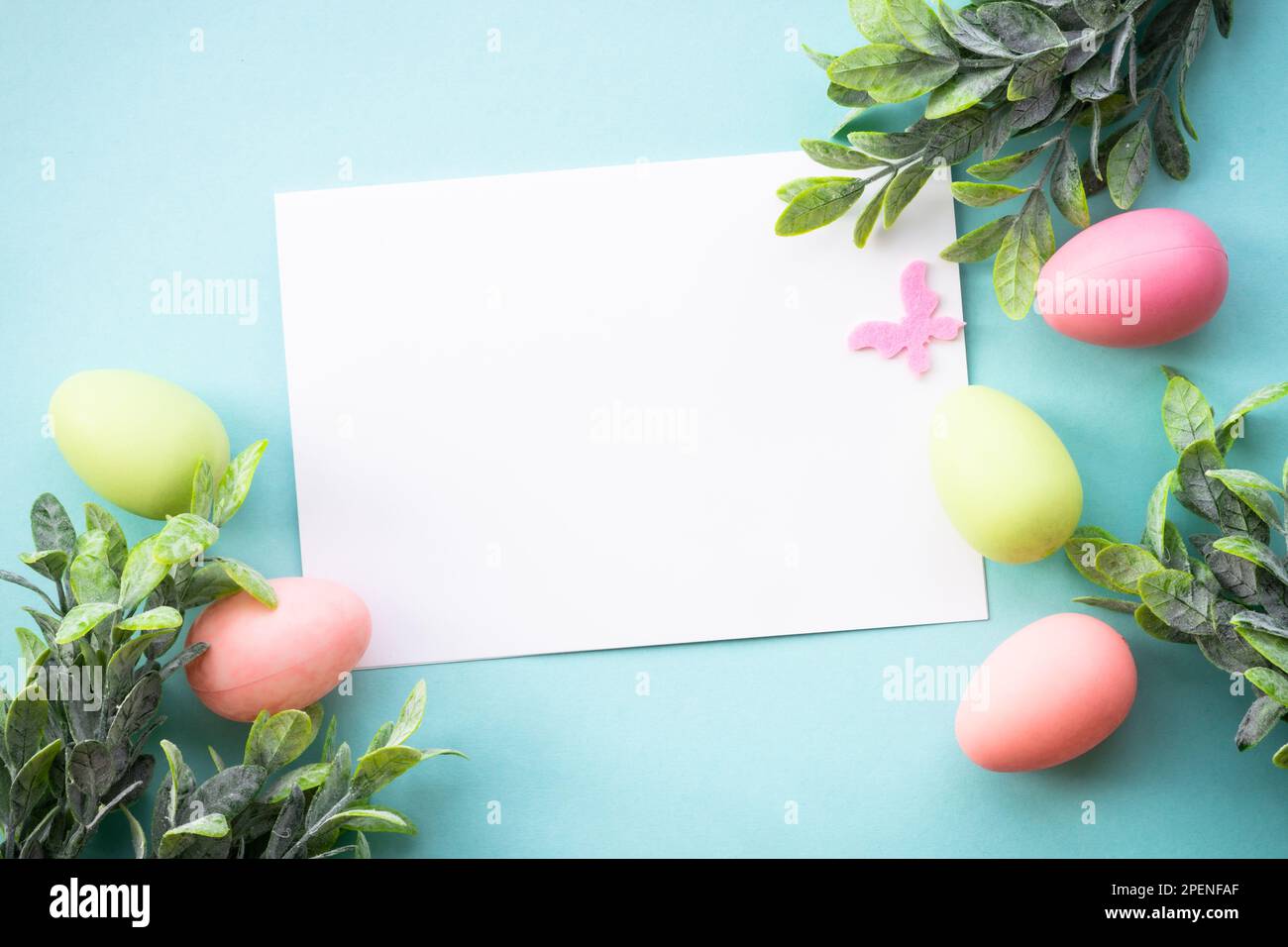 Easter background with Eggs, rabbit and spring flowers at blue ...