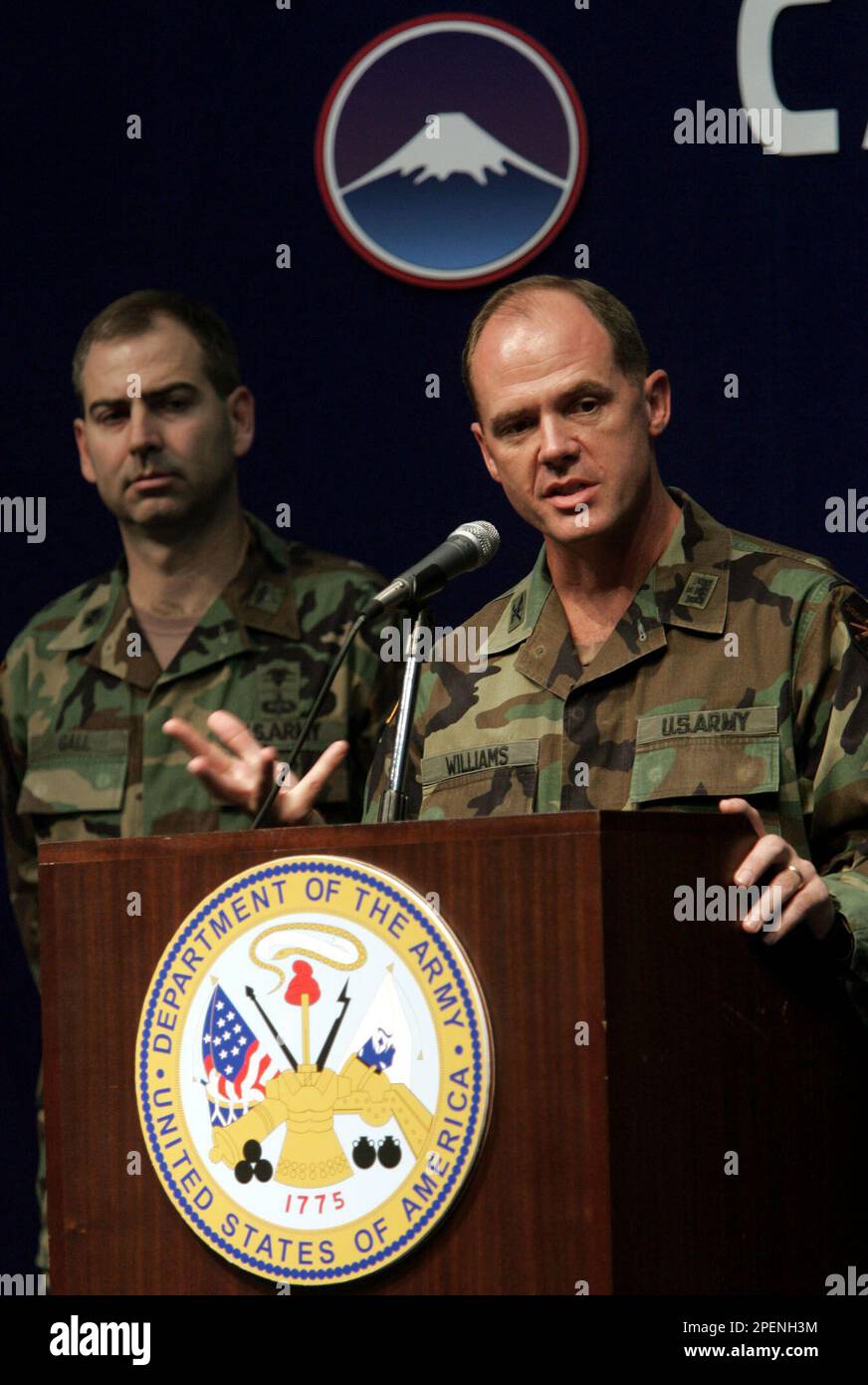 U.S. Army Col. Garland Williams, right, speaks to reporters about ...