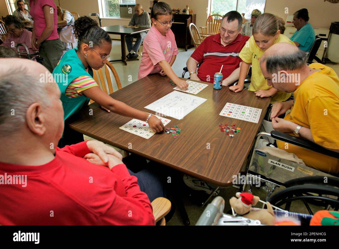 Girl Scouts from Troop 84 play bingo Sunday, Sept. 12, 2004, with ...