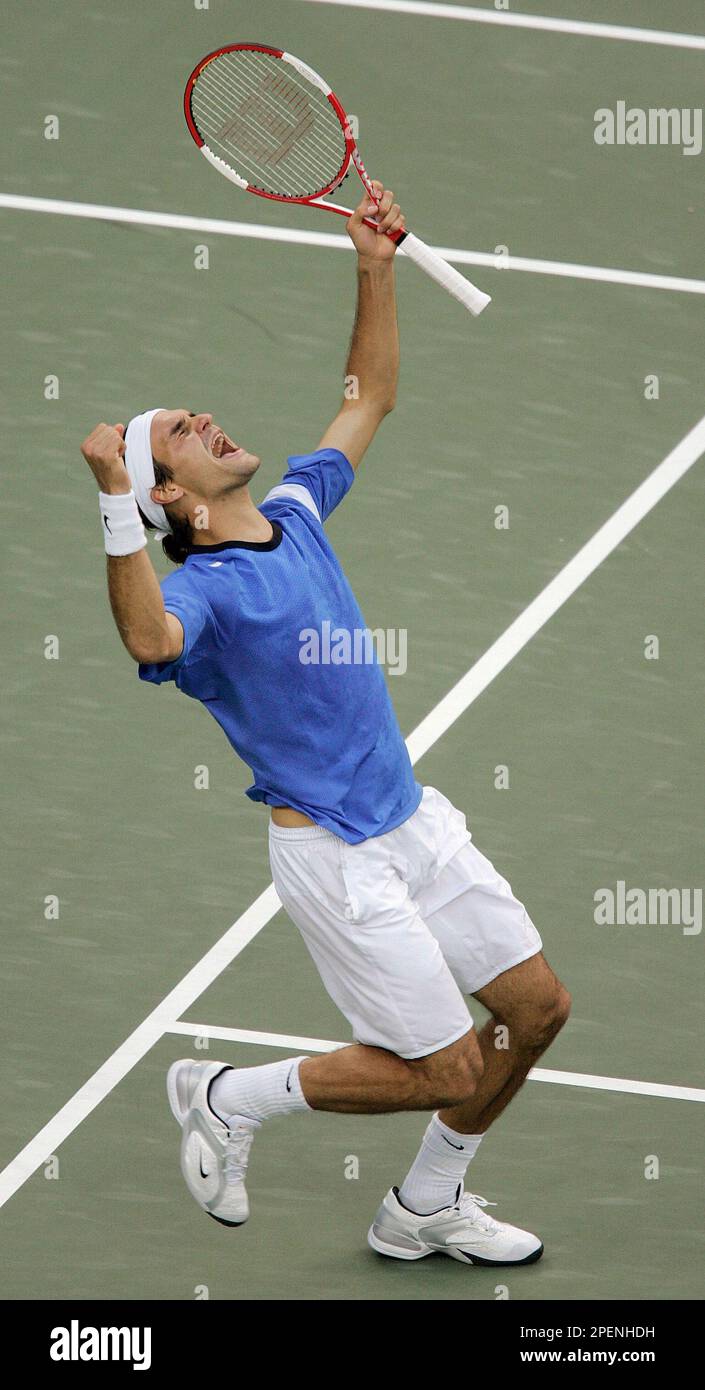 Roger Federer, of Switzerland, reacts after defeating Lleyton Hewitt ...