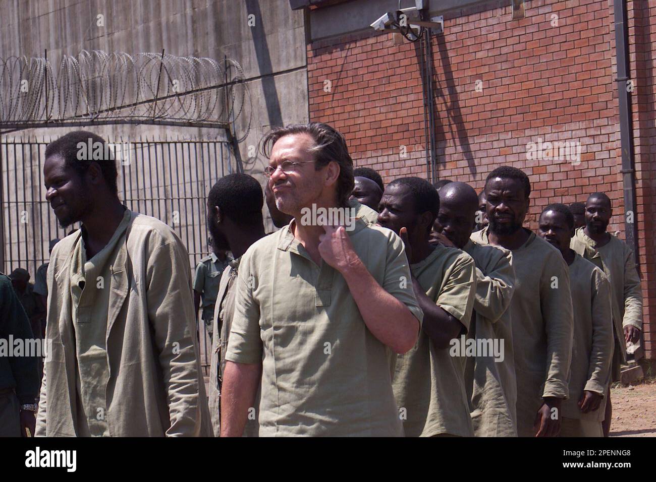 Former British special forces soldier Simon Mann, center, seen at ...