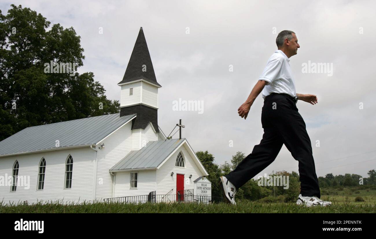 ** FILE ** Democratic Senate candidate Eric Fingerhut walks past Beulah ...