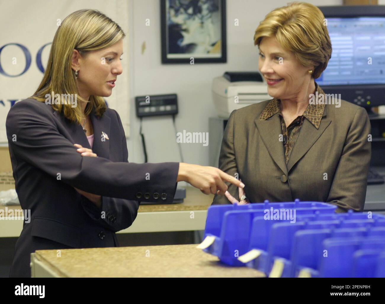 First lady Laura Bush gets a guided tour Thursday, Sept. 9, 2004, of ...