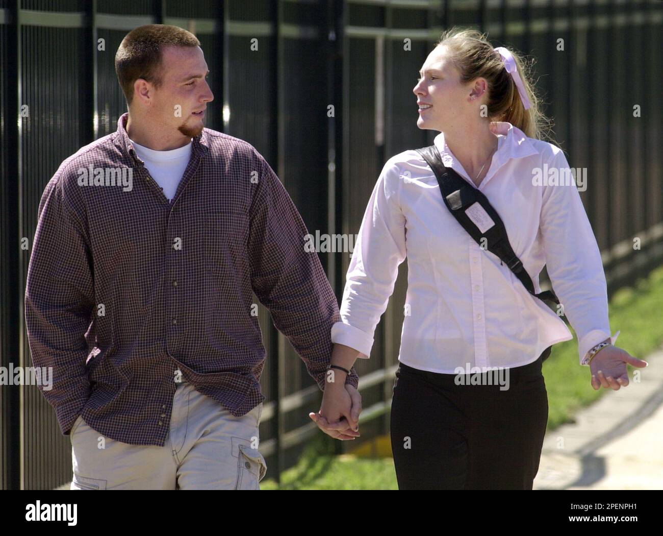 Katie Wolfmeyer, right, returns to the federal courthouse in East St ...