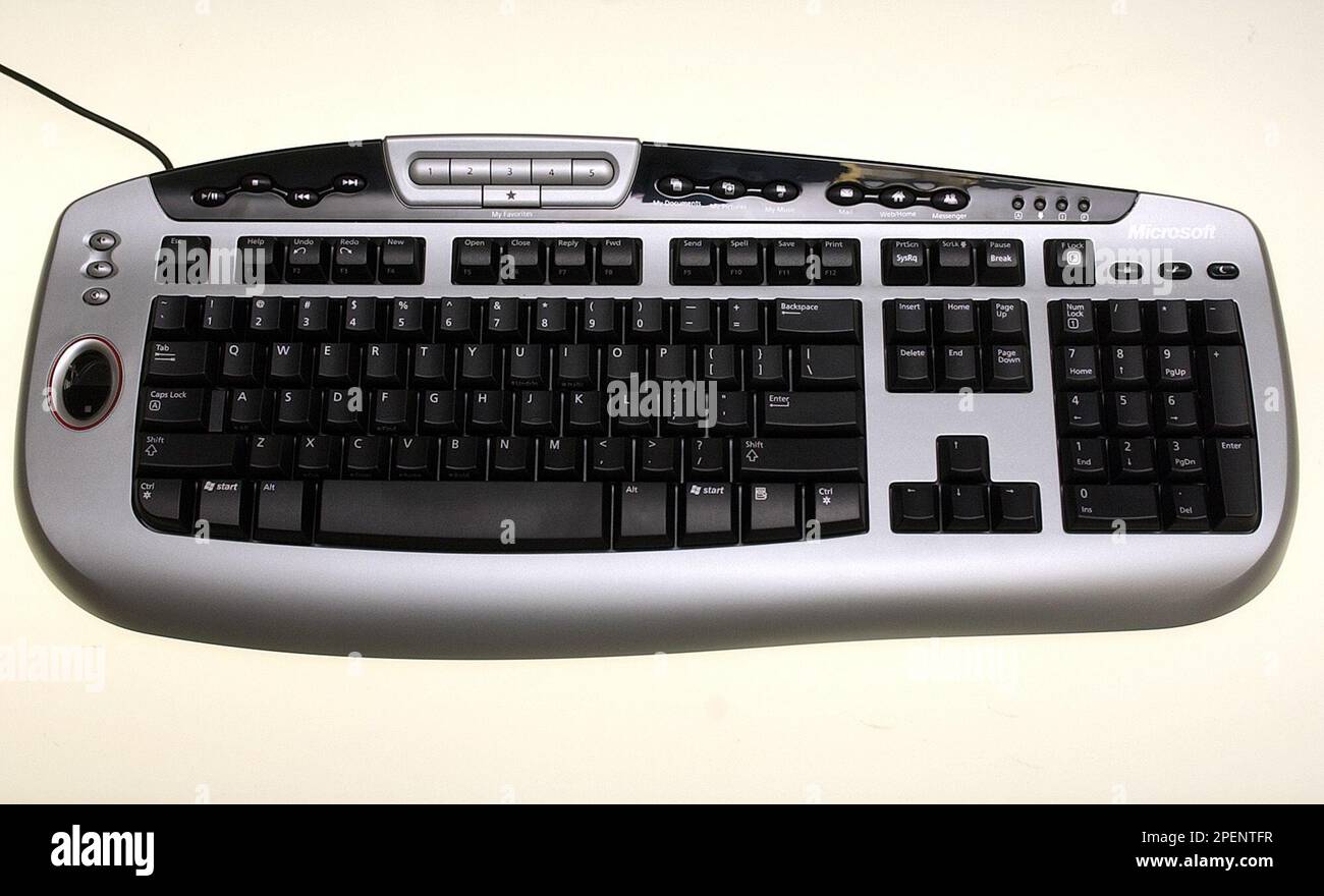 Microsoft's new PC Fingerprint Reader is seen on the left side of this ...