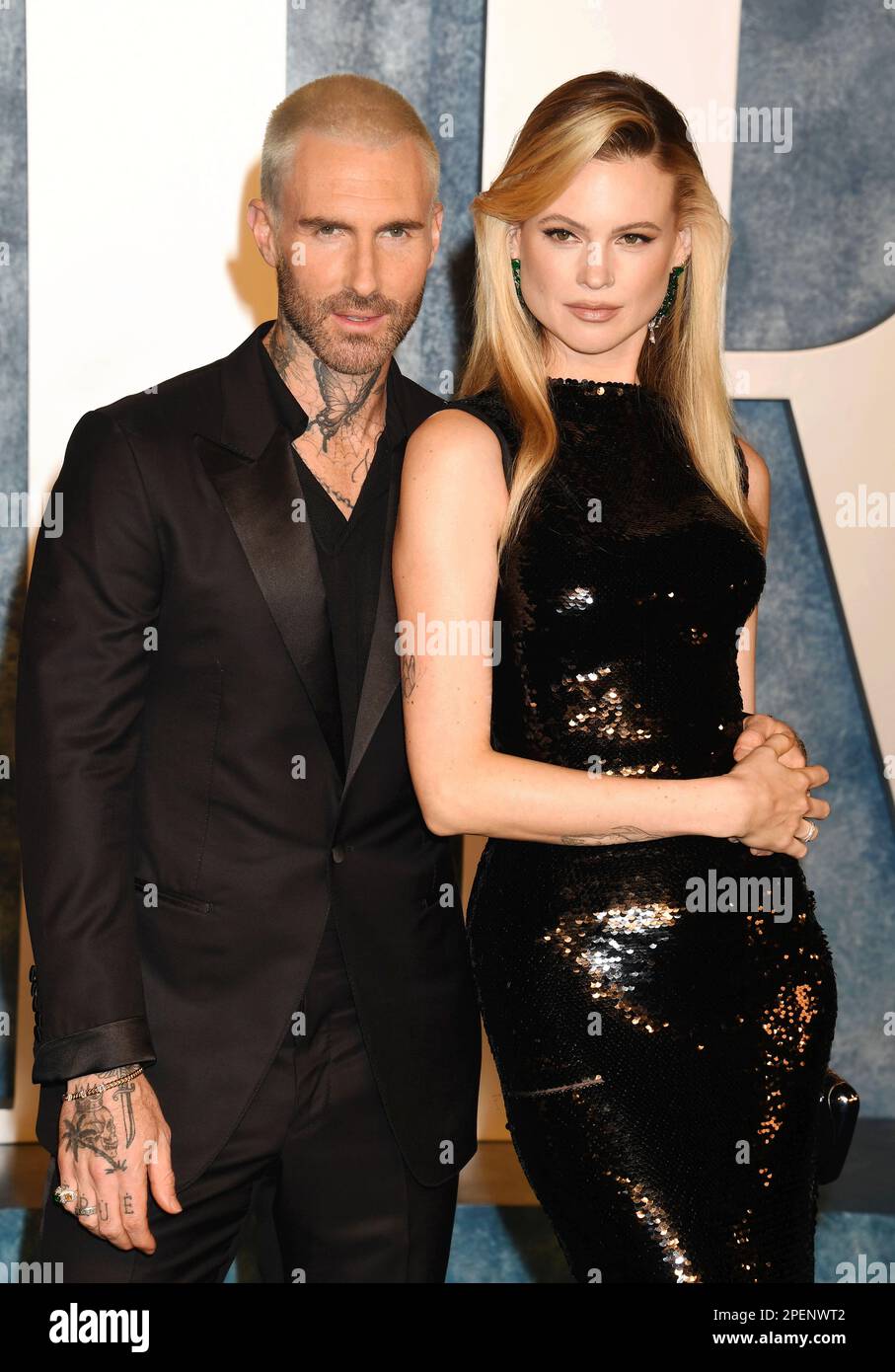 BEVERLY HILLS, CALIFORNIA - MARCH 12: (L-R) Adam Levine and Behati ...