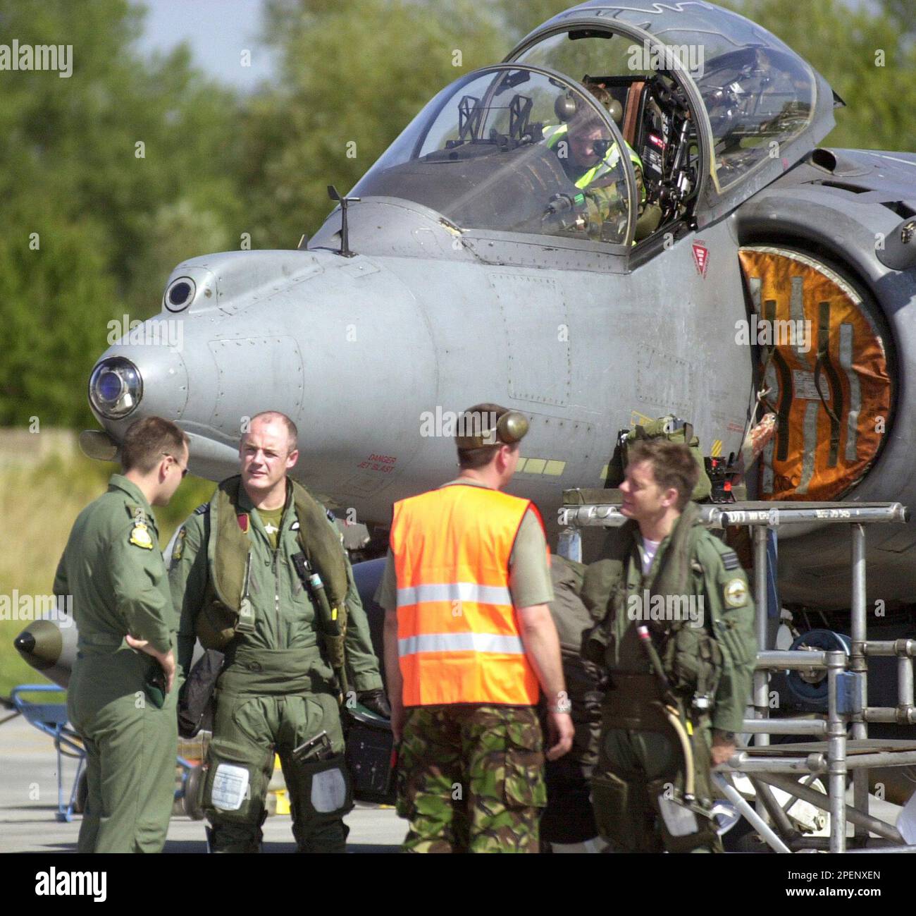 A Czech pilot, left, chats with British pilots and a British forward ...