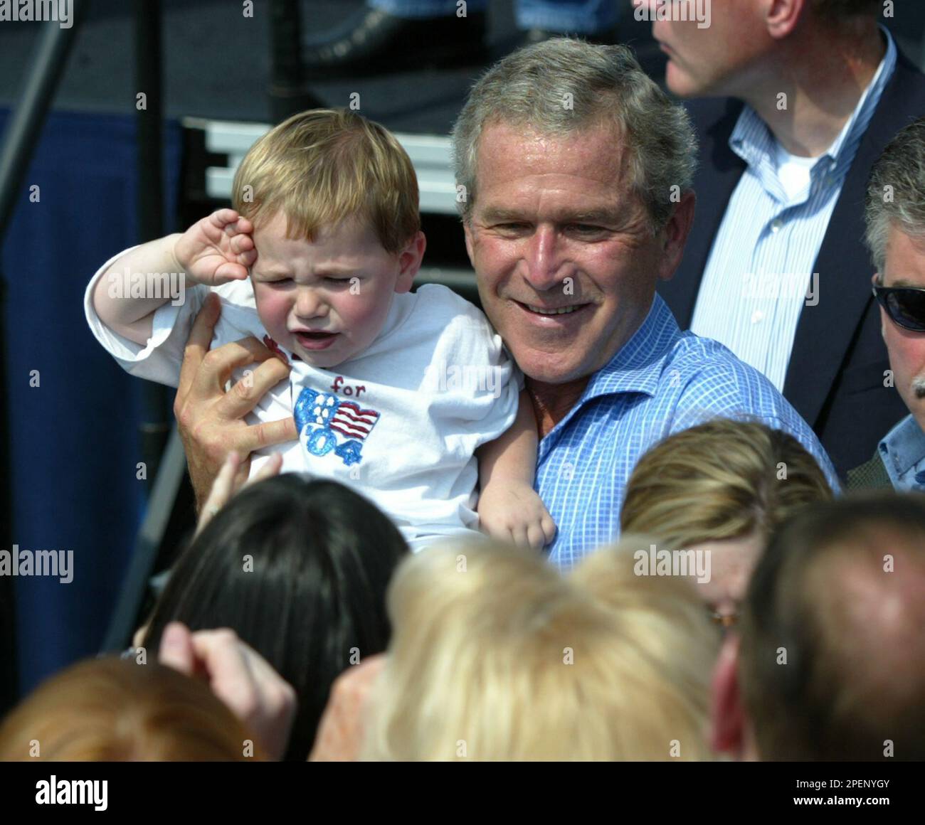 President Bush holds Ian Sears, 19 months, from Charleston, W.Va ...