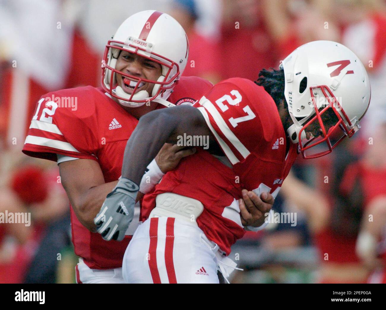 Nebraska quarterback Joe Dailey (12) celebrates a pass completion to ...