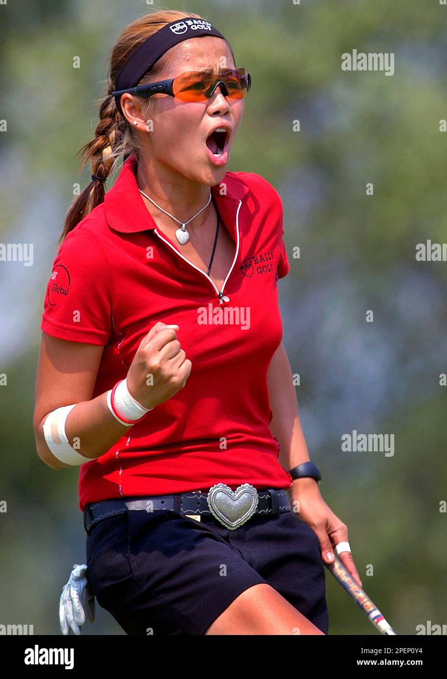 Jennifer Rosales of the Philippines celebrates her birdie putt on the ...