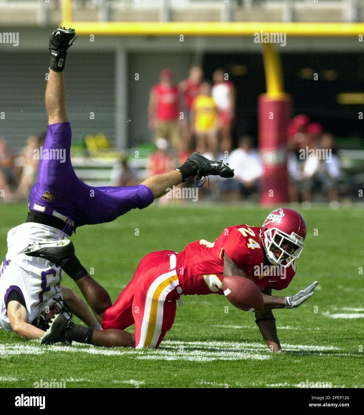 Northern Iowa's Terrance Freeney, left, is upended by Iowa State's ...