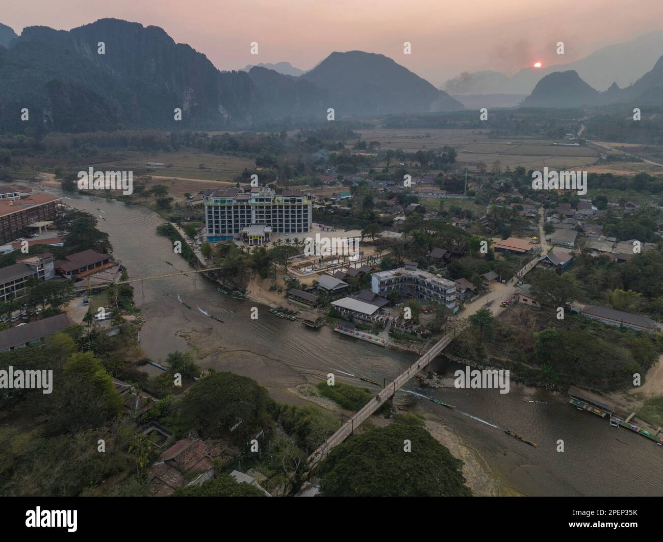Aerial view of Vang Vieng and Nam Song river at sunset, Laos Stock ...