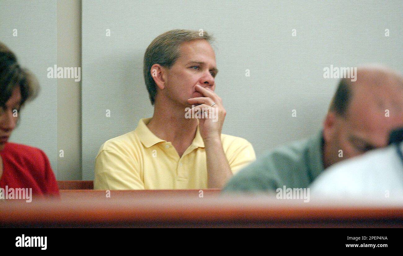 Elizabeth Smart's father, Ed Smart, looks on as charges are read ...
