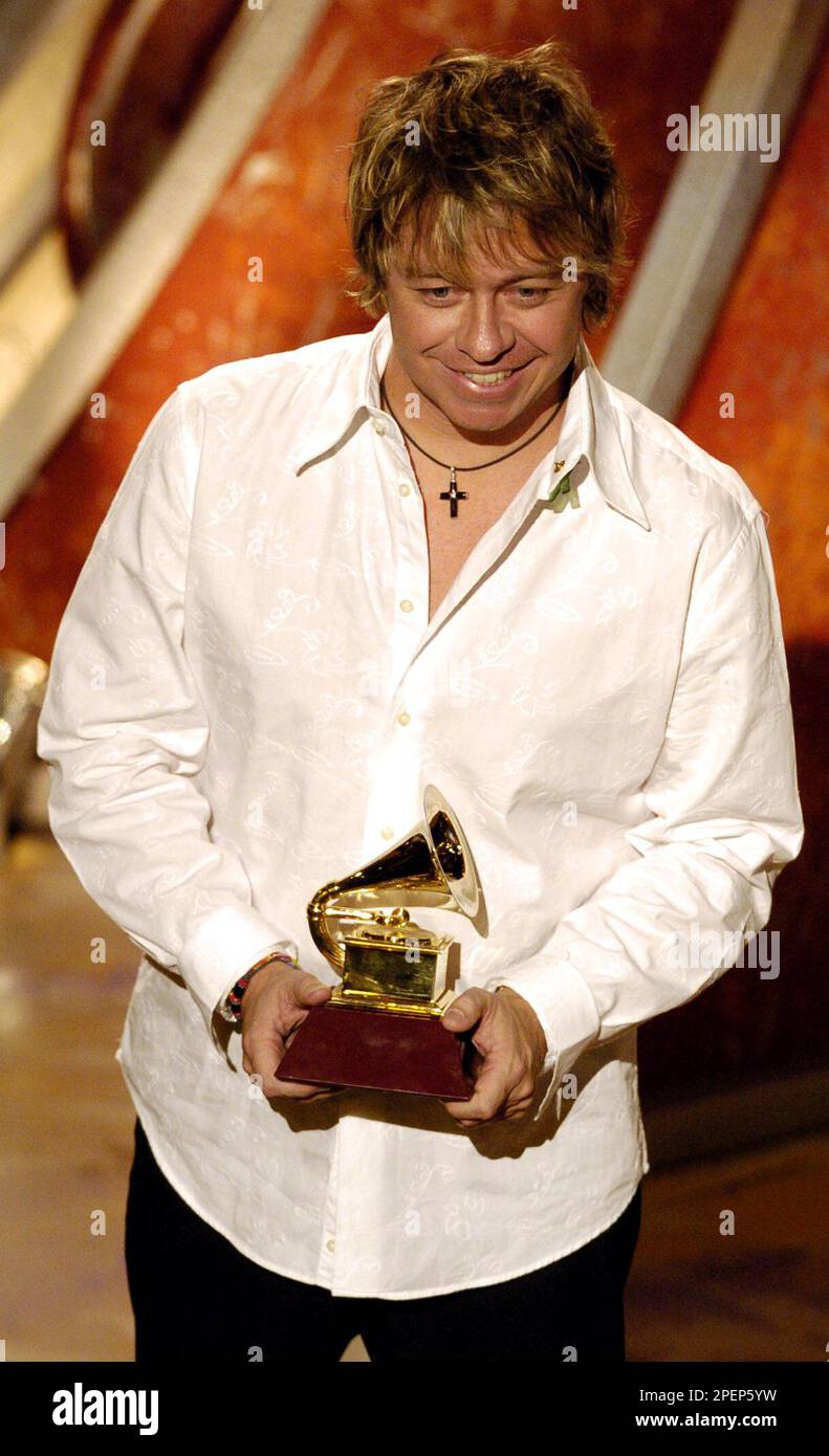 Fernando Osorio accepts the award for Best Tropical Song for his and co ...