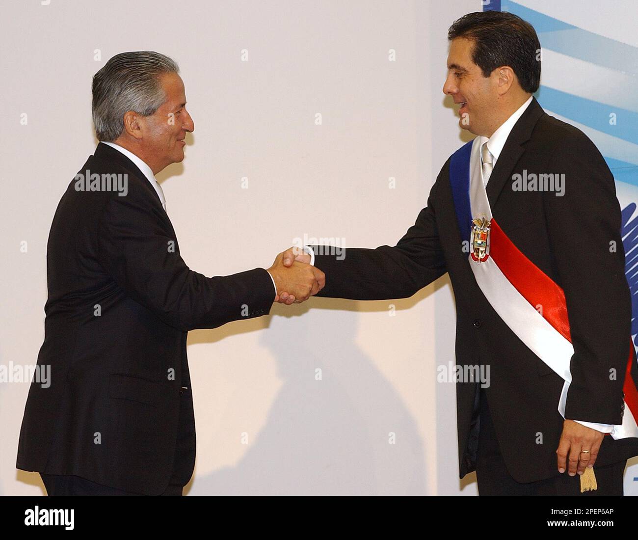 Panama's new President Martin Torrijos, right, shakes hands with ...