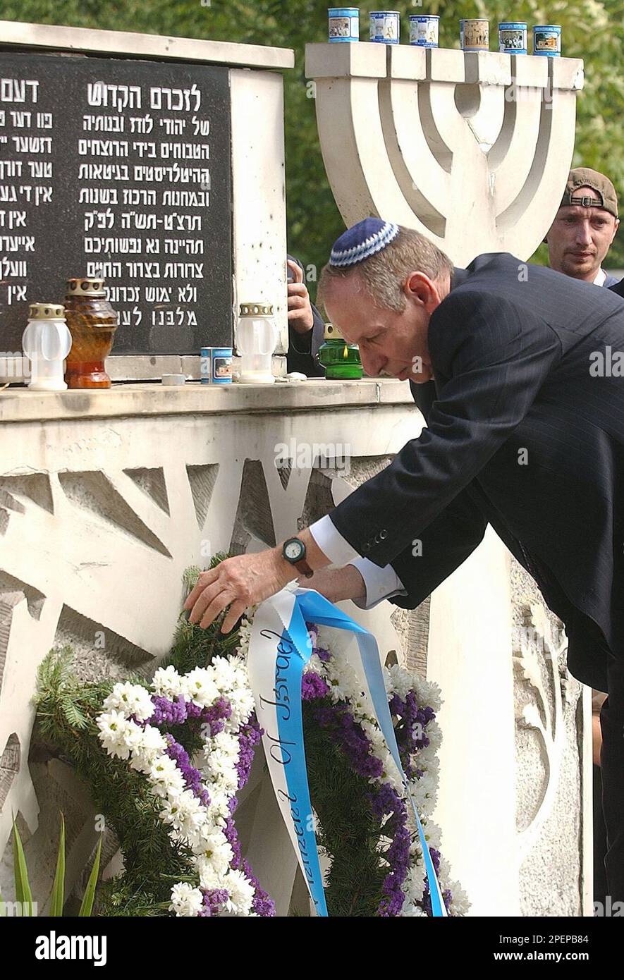 Ilan Shalgi, Israeli Science and Technology minister, lays a wreath at ...