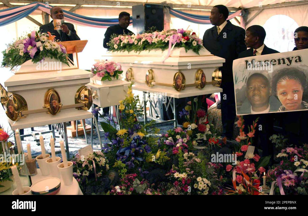 A poster of David Masenta and Mgwanini Molomo shows the couple in life ...