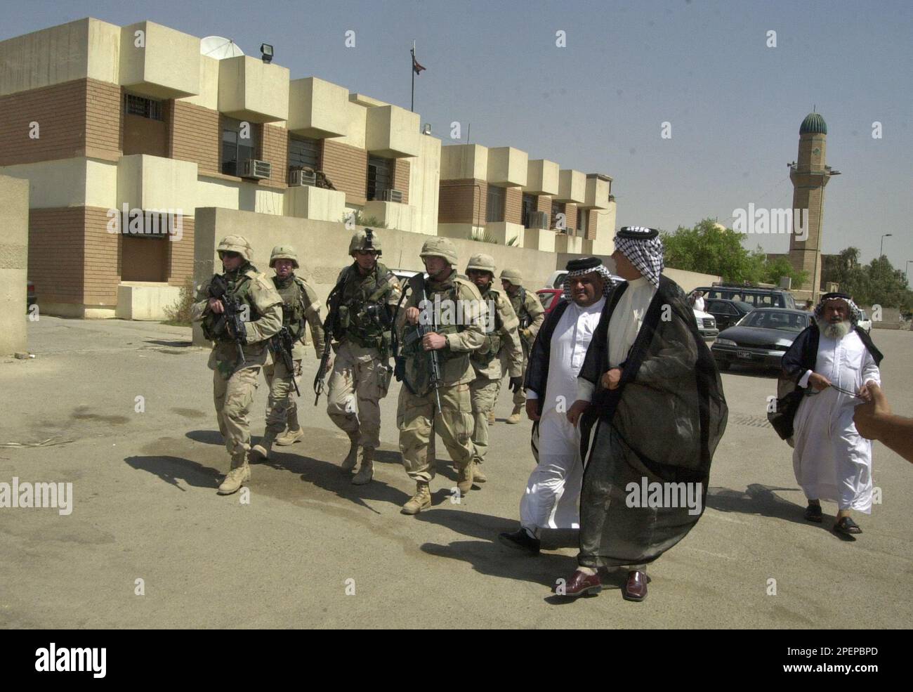 U.S. army representatives and leaders of Shiite tribes on the way to ...