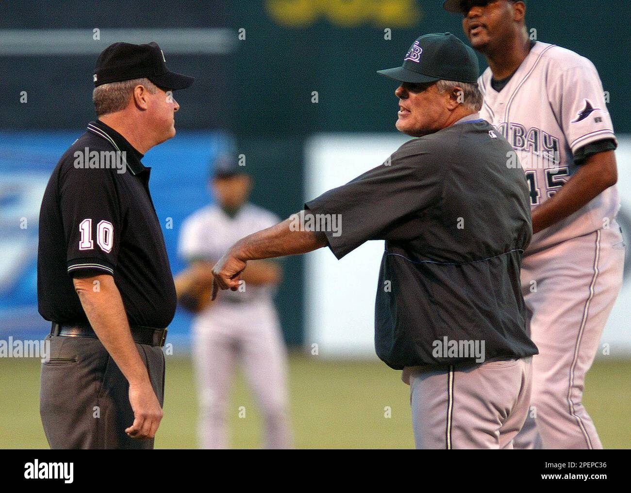 Tampa Bay Devil Rays' manager Lou Piniella, center, argues with third ...