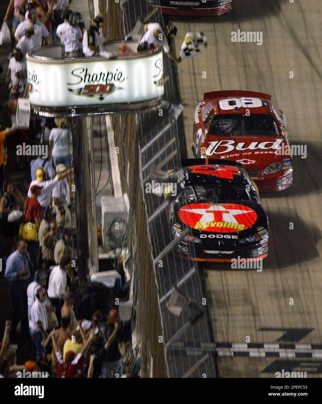 Dale Earnhardt Jr. (8) takes the checkered flag to win the NASCAR ...