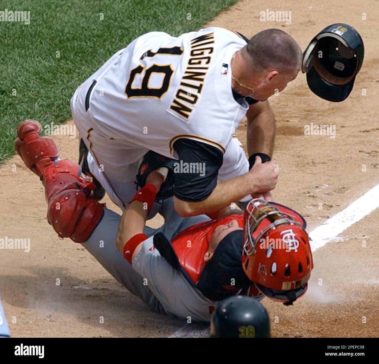 Pittsburgh Pirates' Ty Wigginton, top, collides with St. Louis ...
