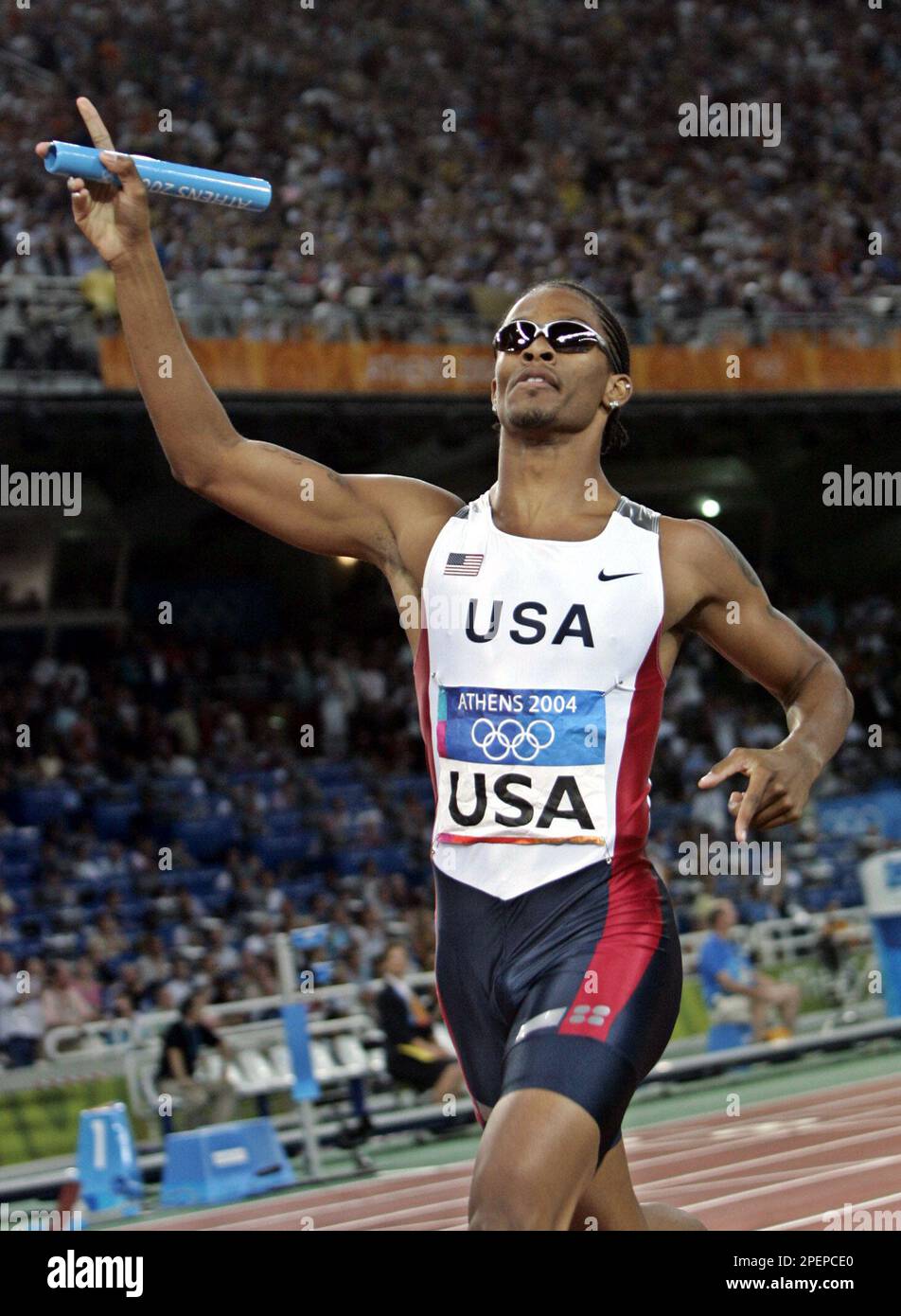 The United States' Darold Williamson celebrates after crossing the ...