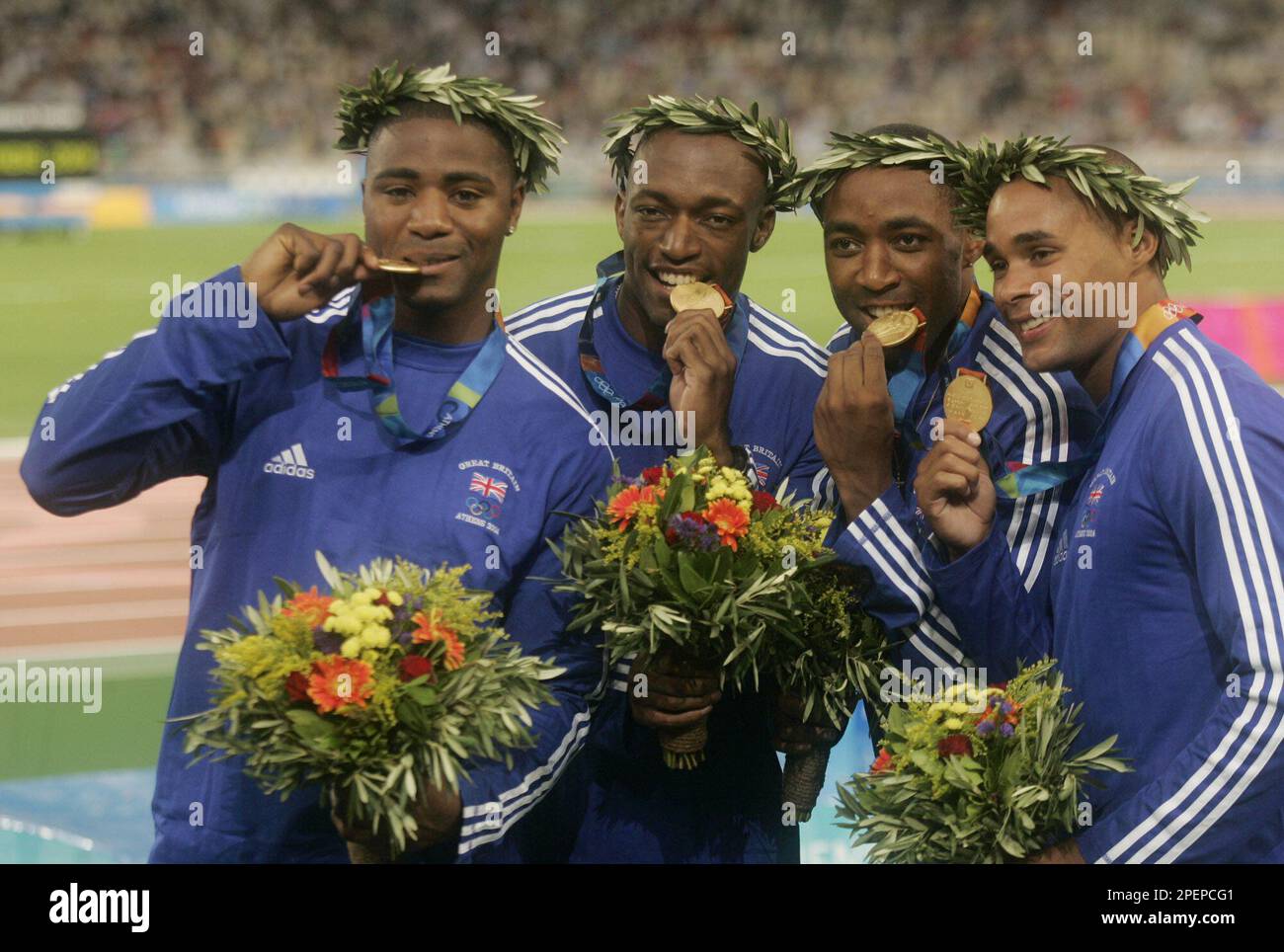 Britain's men's 4x100 relay team, from left, Lewis Francis, Marlon ...