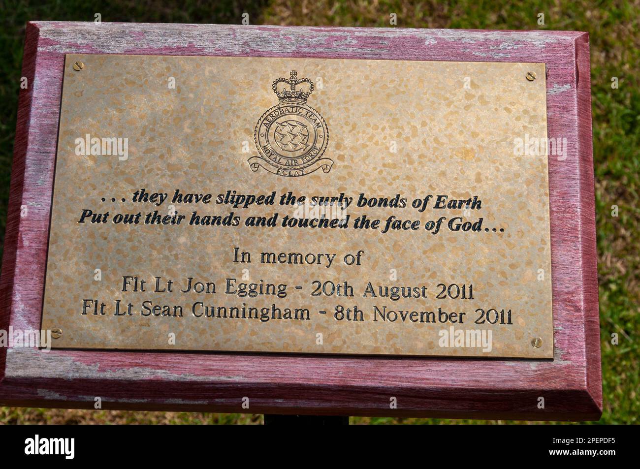 Memorial plaque for dead Royal Air Force Red Arrows display team pilots at RAF Scampton, UK. Flt ...