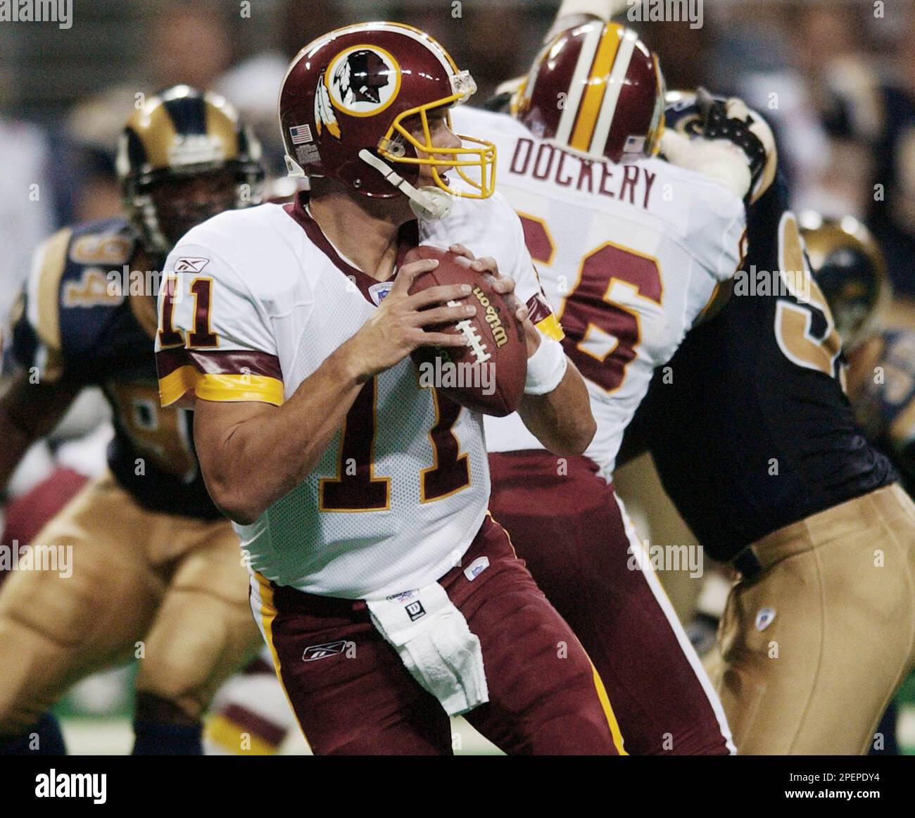 Washington Redskins quarterback Patrick Ramsey (11) sets to pass while ...